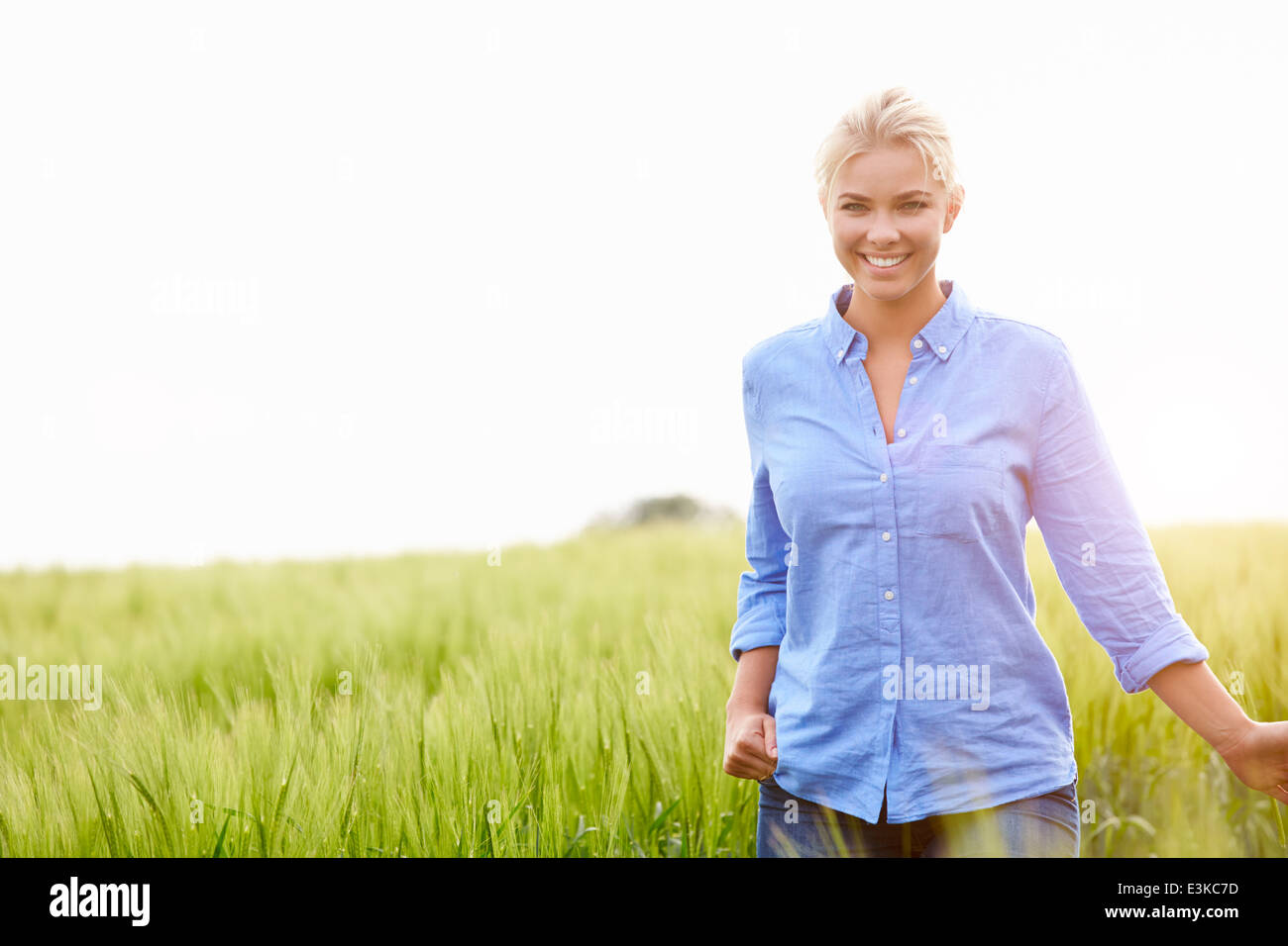 Young pretty woman walking hi-res stock photography and images - Alamy