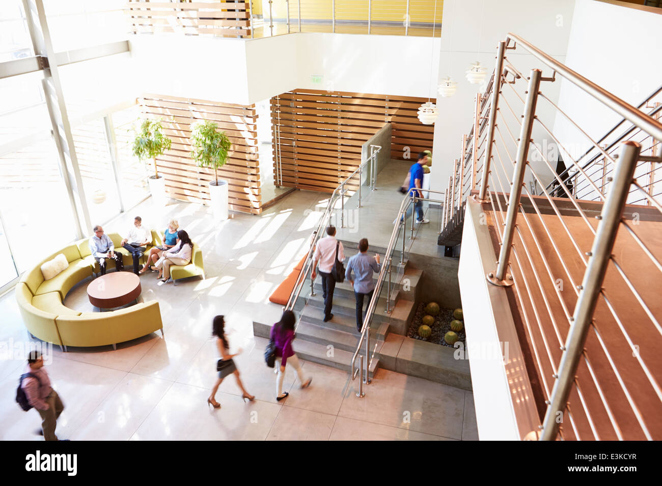 Reception Area Of Modern Office Building With People Stock Photo - Alamy