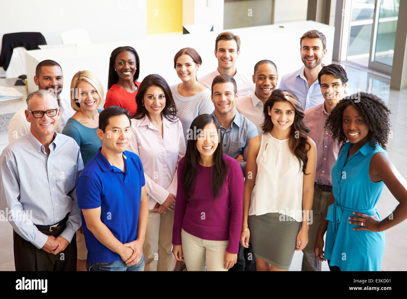 Portrait Of Multi-Cultural Office Staff Standing In Lobby Stock Photo ...