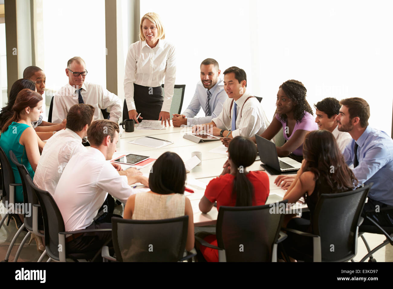 Boardroom person addressing group hi-res stock photography and images ...