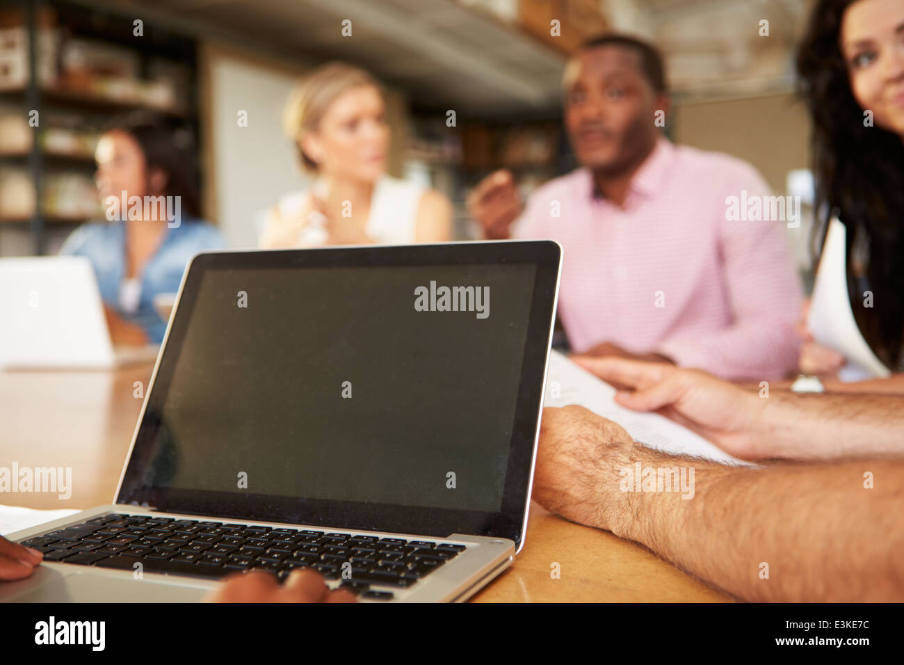 Close Up Of Laptop Being Used By Architect In Meeting Stock Photo - Alamy