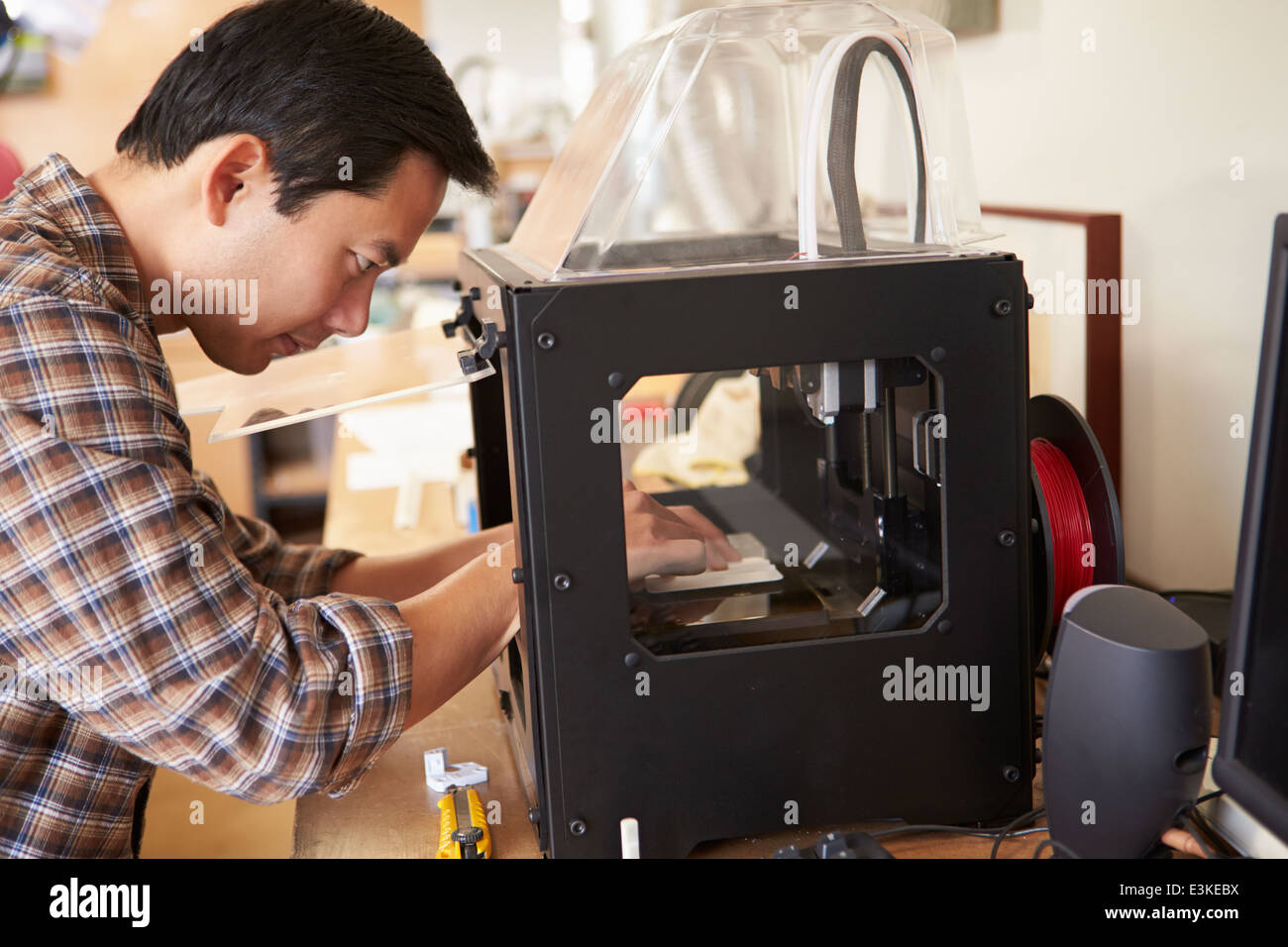 Male Architect Using 3D Printer In Office Stock Photo - Alamy