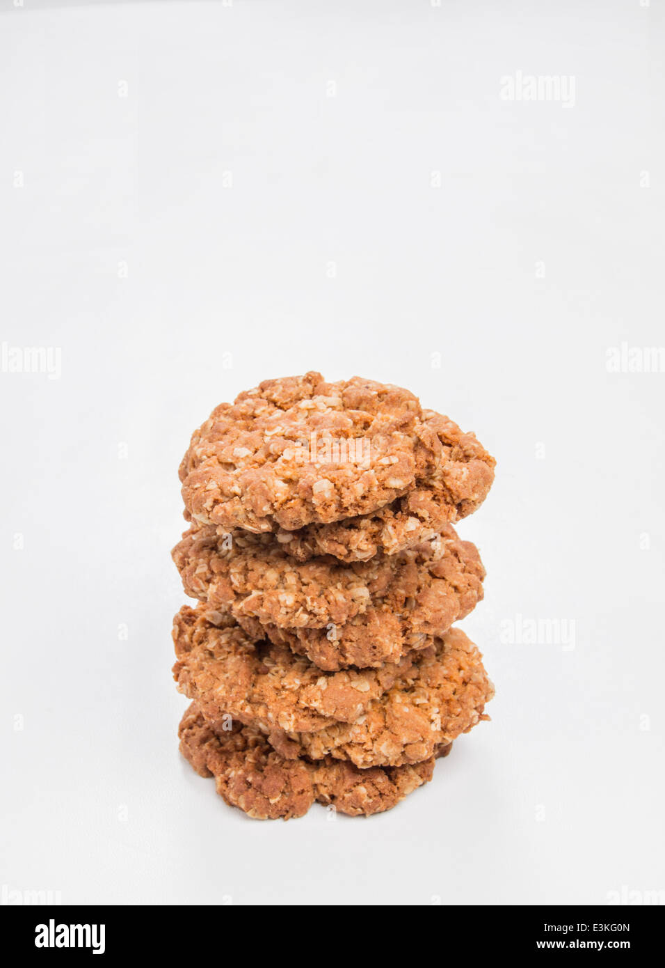 crunchy oat cookies/biscuits in a stack on a pale background [Pt] [CO ...