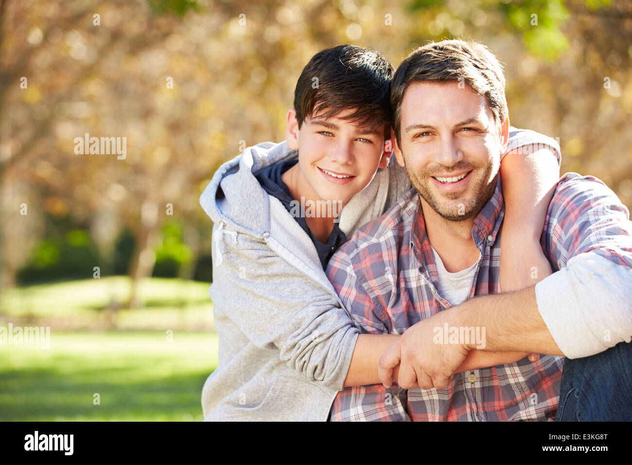 Portrait Of Father And Son In Countryside Stock Photo - Alamy