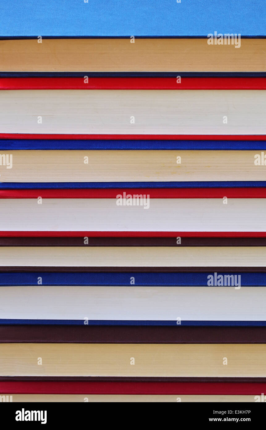 A stack of different brightly coloured books Stock Photo - Alamy