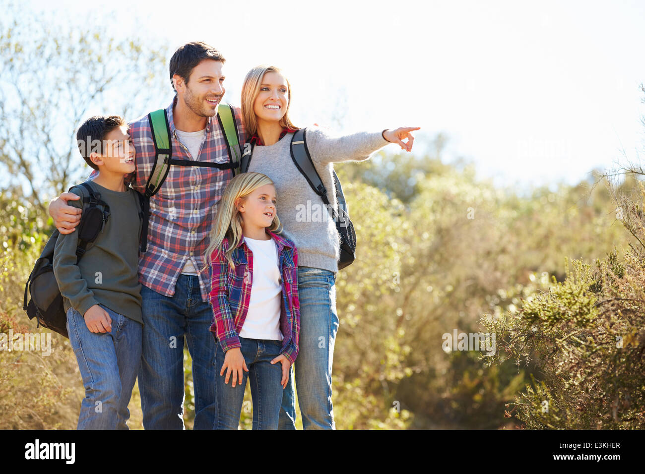 Family wearing backpacks hi-res stock photography and images - Alamy