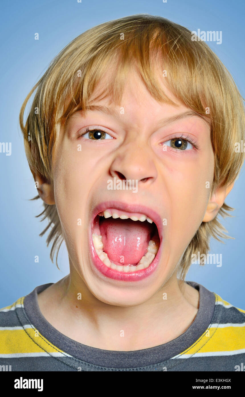 portrait of young boy scream Stock Photo - Alamy
