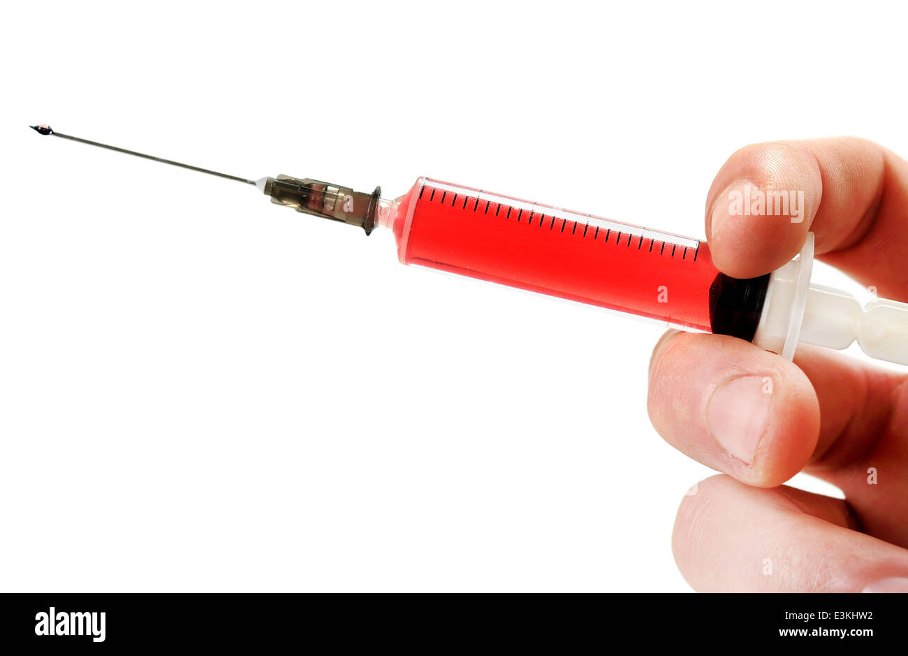 Isolated Syringe in male hand Stock Photo - Alamy