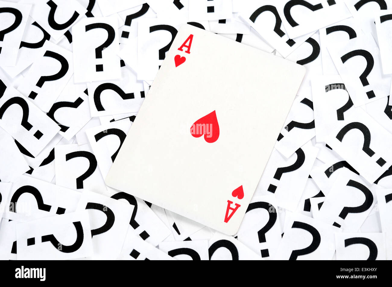 Ace card on question mark background Stock Photo - Alamy