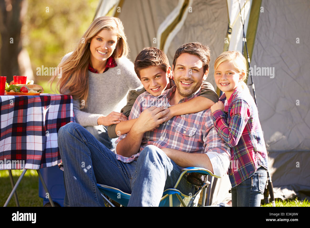 Family Enjoying Camping Holiday In Countryside Stock Photo - Alamy