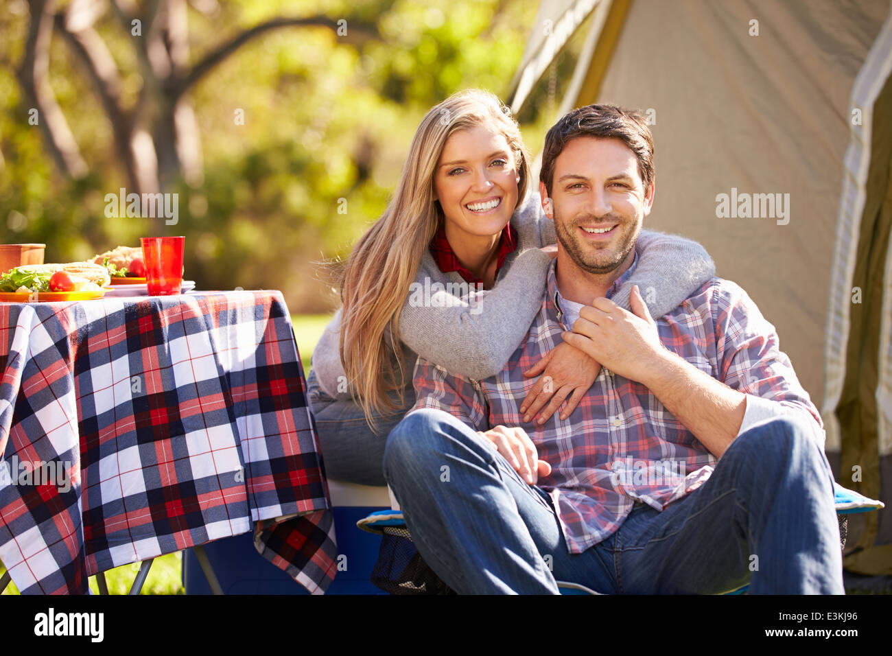 Couple Enjoying Camping Holiday In Countryside Stock Photo - Alamy