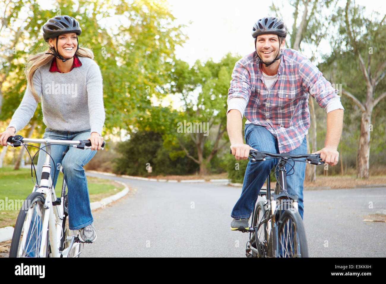 Couple On Cycle Ride In Countryside Stock Photo - Alamy