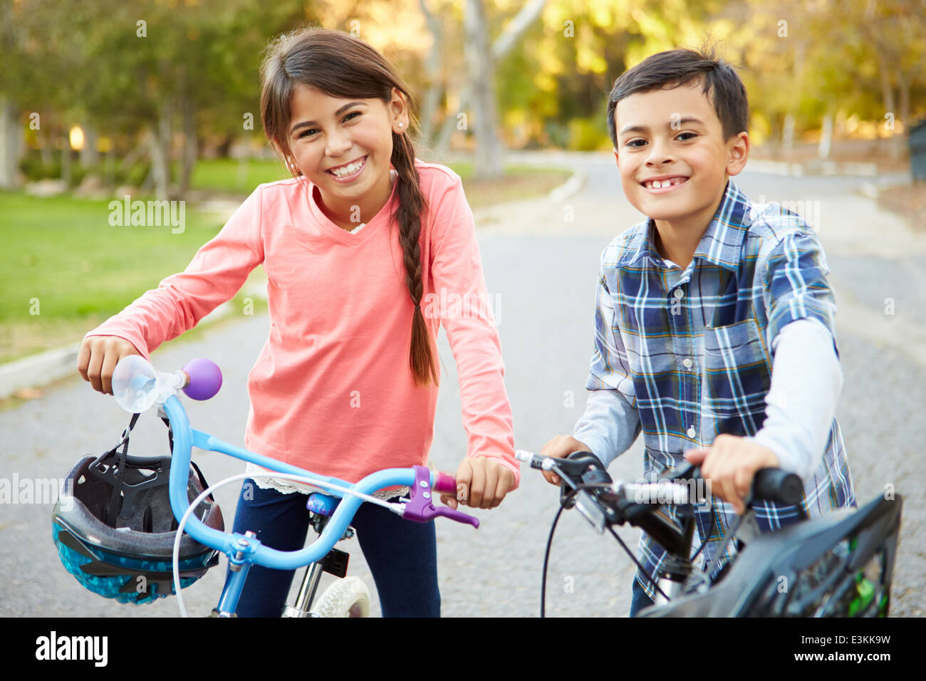 Two Children On Cycle Ride In Countryside Stock Photo - Alamy