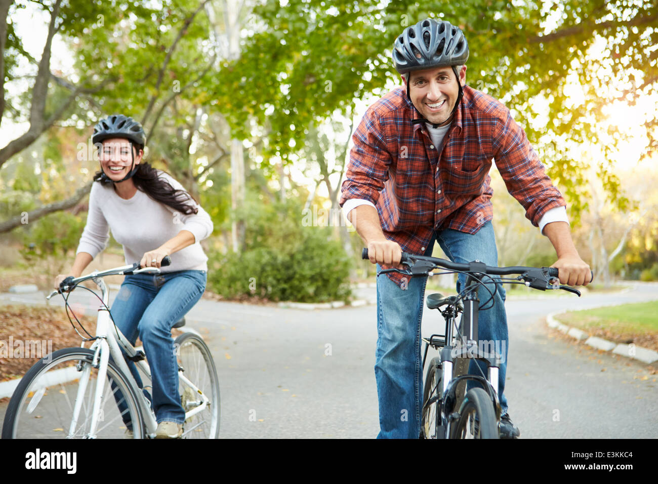 Couple On Cycle Ride In Countryside Stock Photo - Alamy