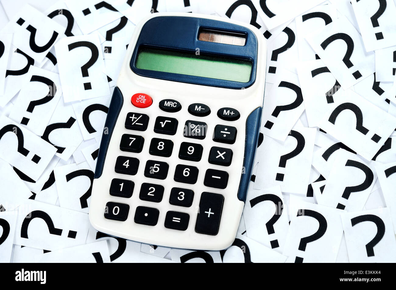 Hand calculator on question mark background Stock Photo - Alamy