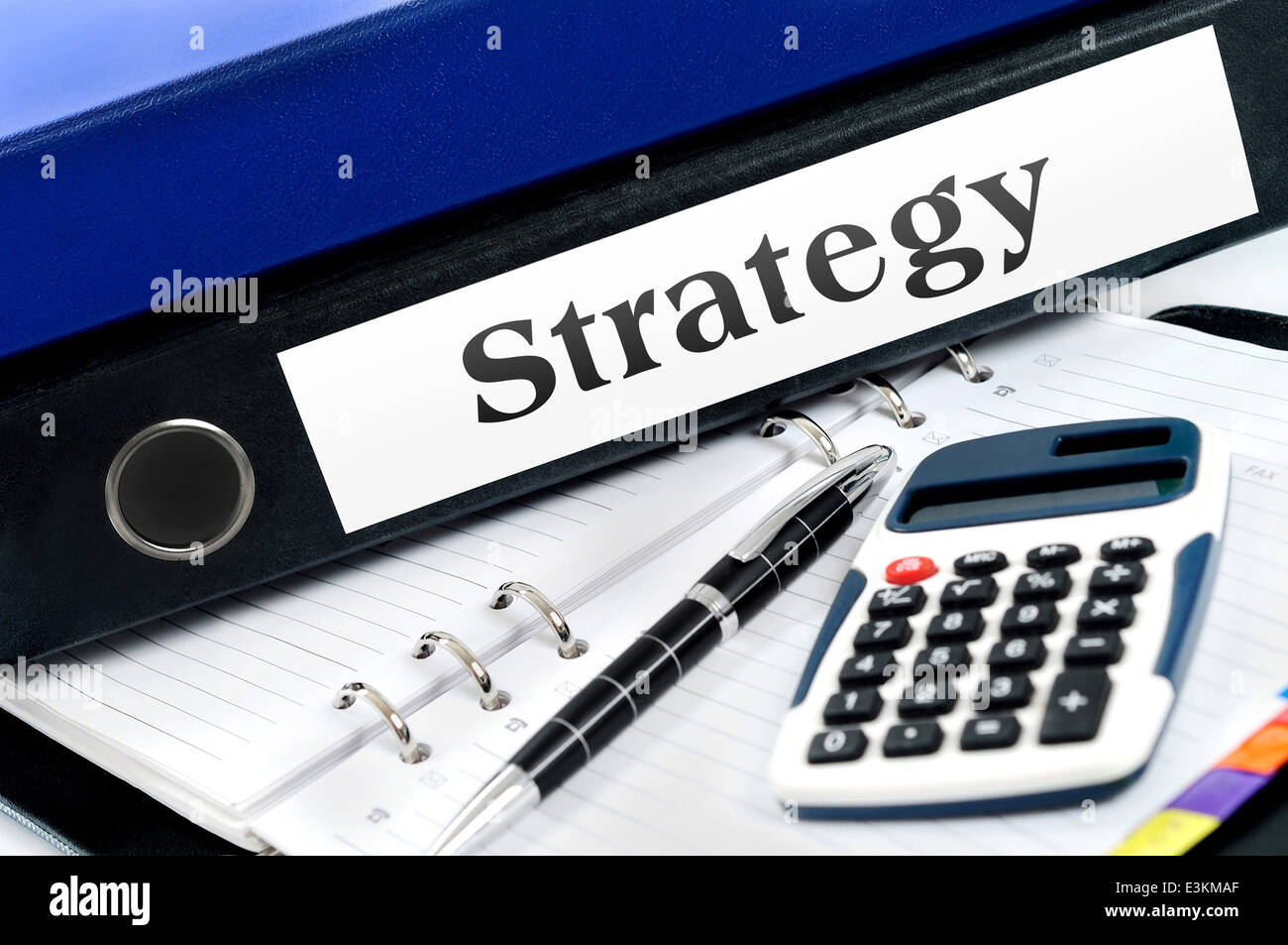 Strategy folder with office tools Stock Photo - Alamy