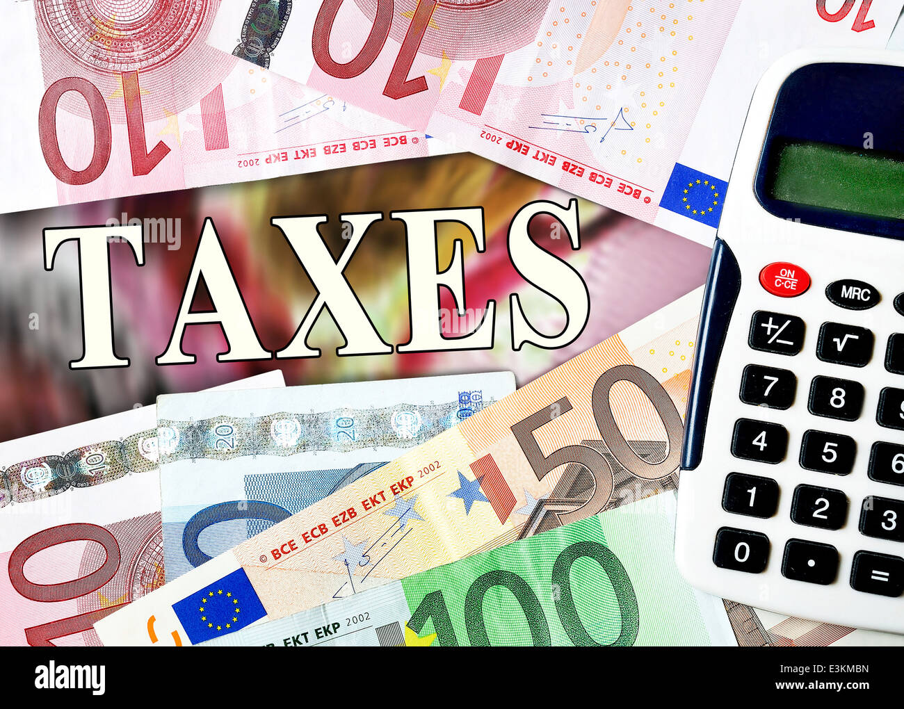 Taxes word with money background Stock Photo - Alamy