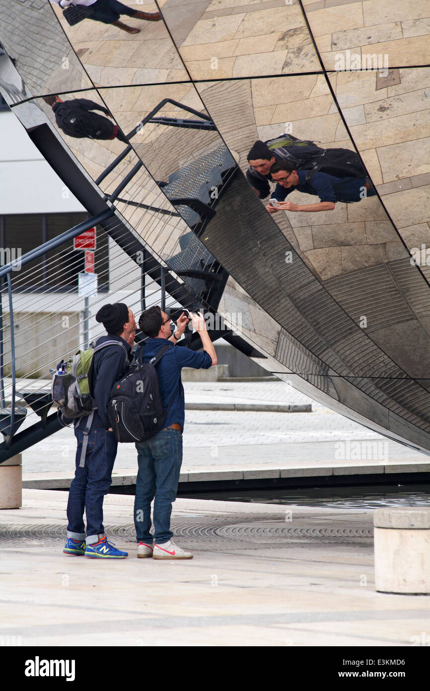 taking a photo of reflections in mirrored planetarium sphere at ...