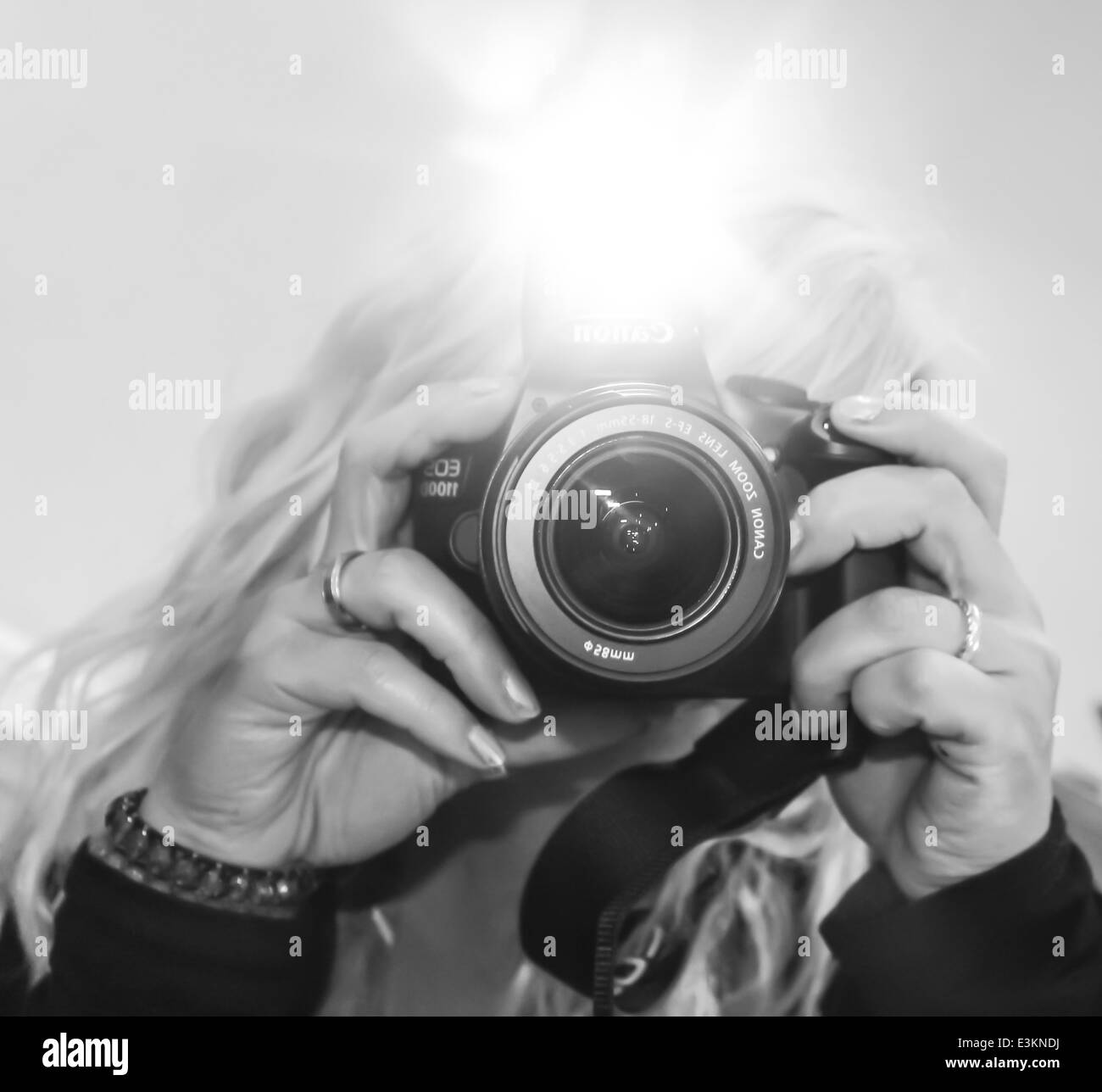 Monochrome image of a photographer Stock Photo - Alamy