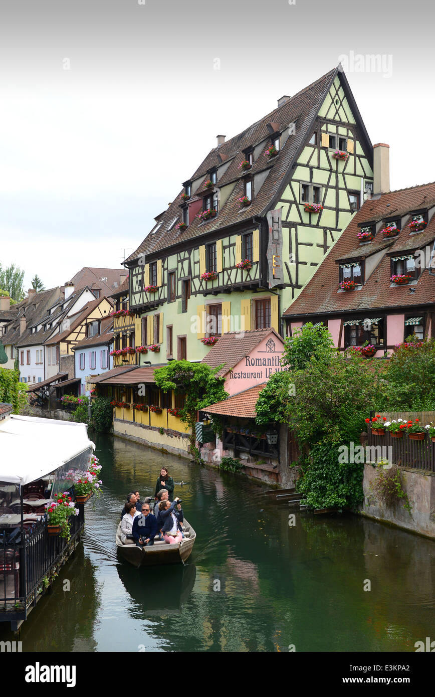 Tourist boat passing the Hotel Le Maréchal Colmar Alsace region France ...