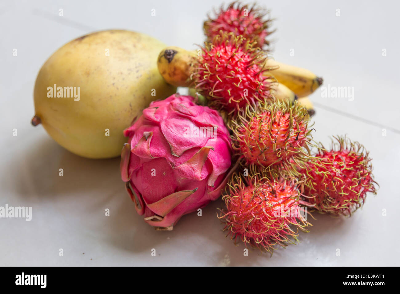 Tropical fruits nestled together Stock Photo - Alamy