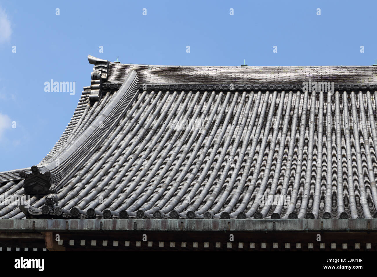 Japanese roof style with blue sky Stock Photo - Alamy