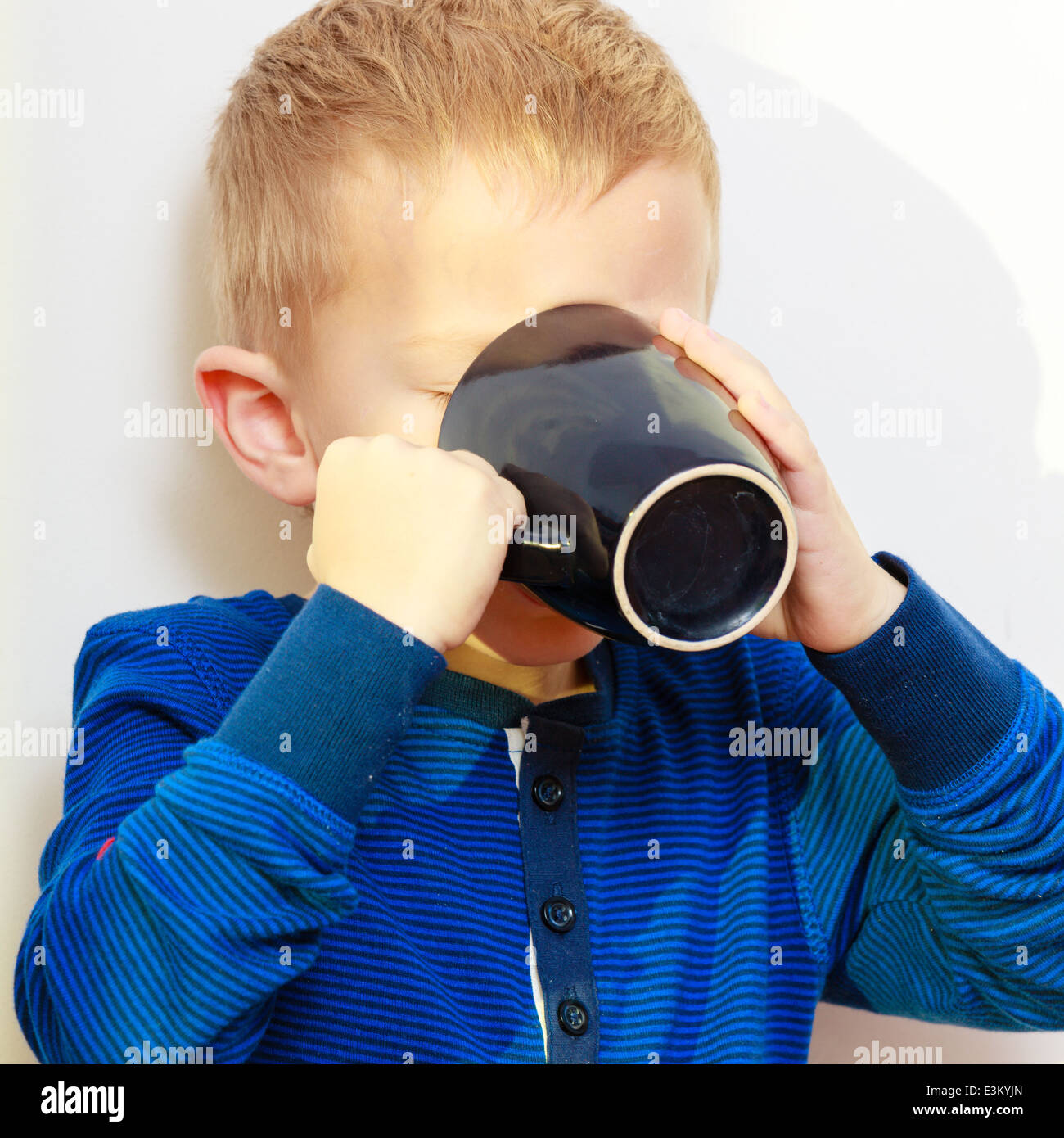 Happy childhood. Funny little boy child kid drinking tea. Indoor Stock ...