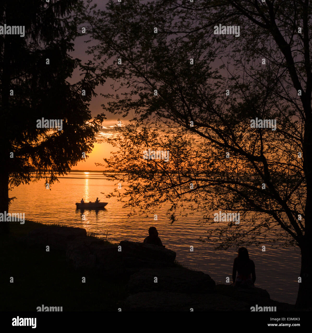 Two men fishing from a boat hi-res stock photography and images - Alamy