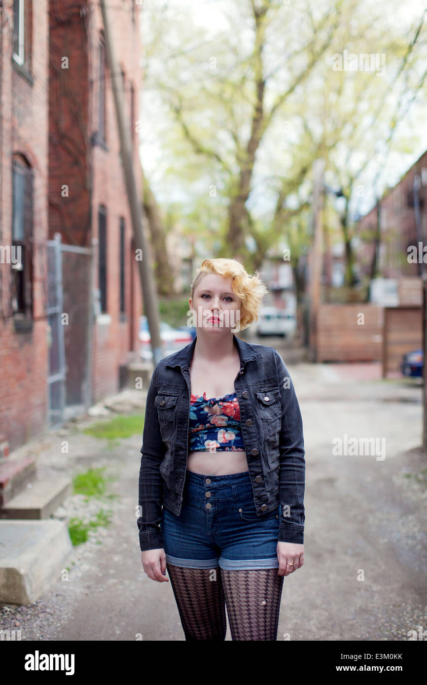 Woman wearing fishnet stockings hi-res stock photography and images - Alamy