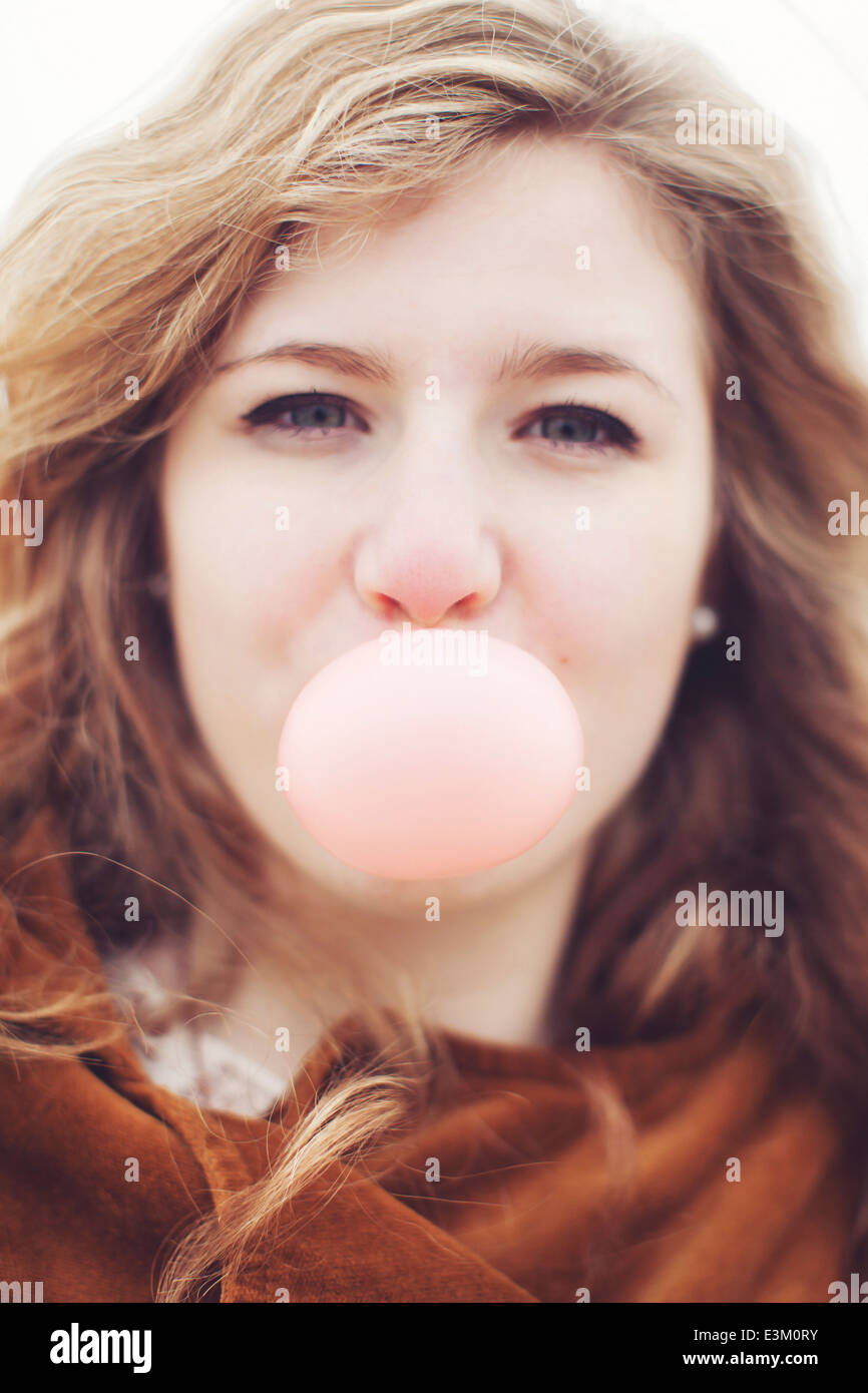 Girl blowing bubble gum hi-res stock photography and images - Alamy