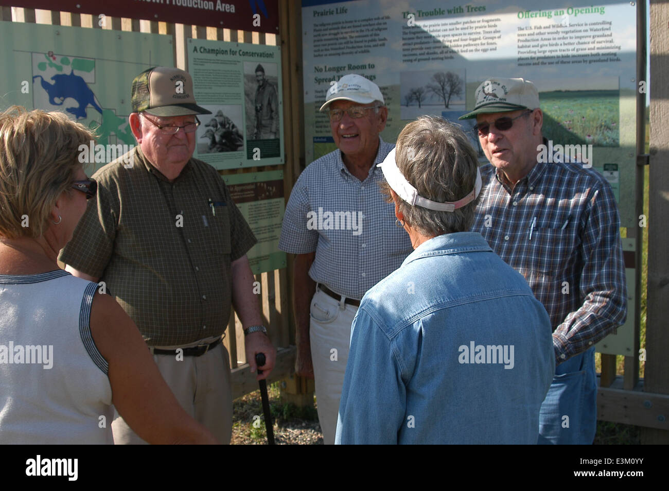 Friends and staff gather at Fergus Falls, Minnesota, to celebrate the ...