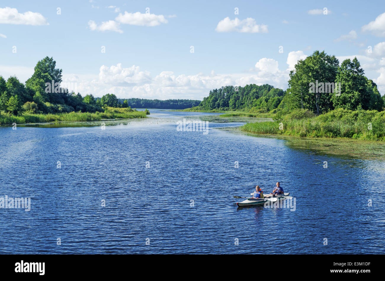 Canoe travel and fishing on the silent forest river in the summer Stock ...