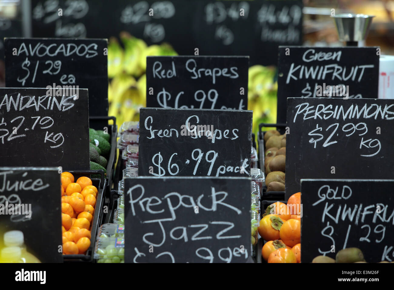 Fruit on sale with prices on notices in a supermarket, Nelson, New ...