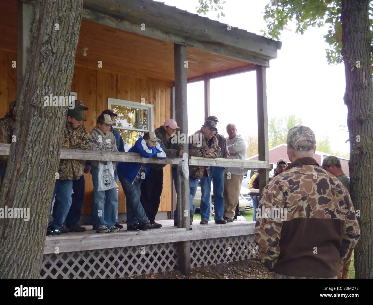 Youth participants listen attentively to a demonstration by Cory ...