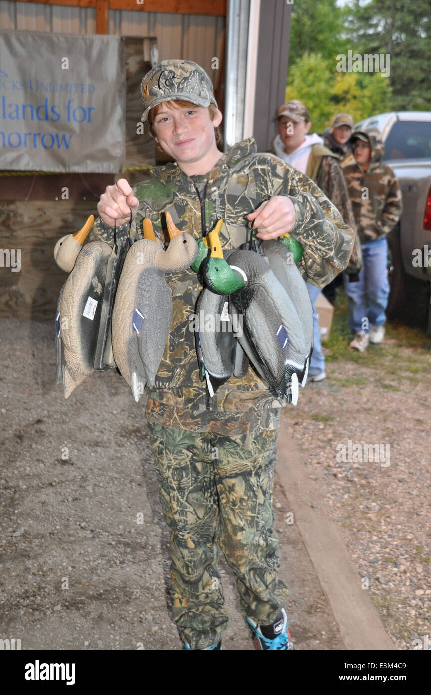 Zack is pictured setting up new decoys for waterfowl hunting. This ...