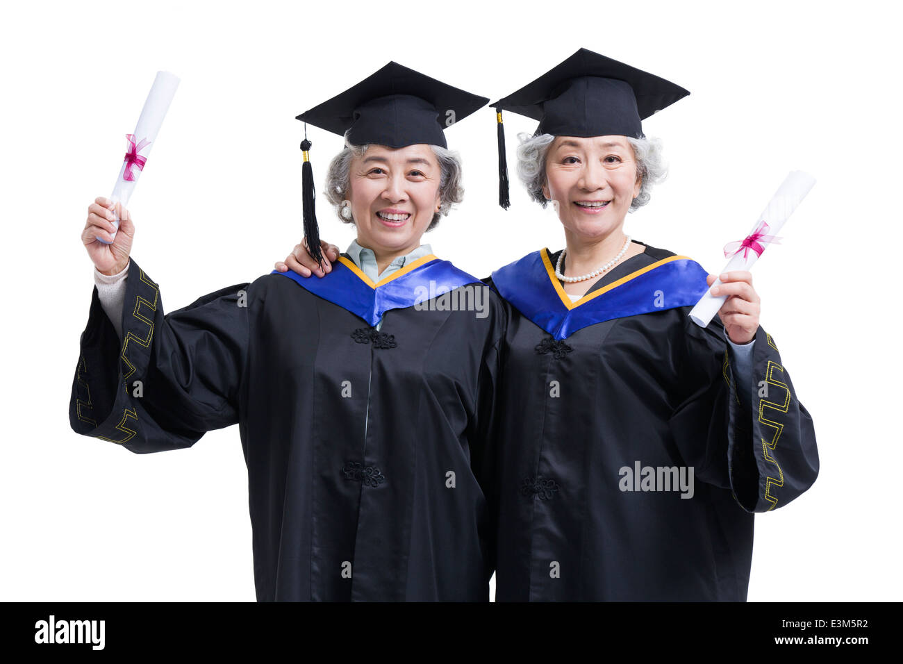 Senior students cheering for graduation Stock Photo - Alamy