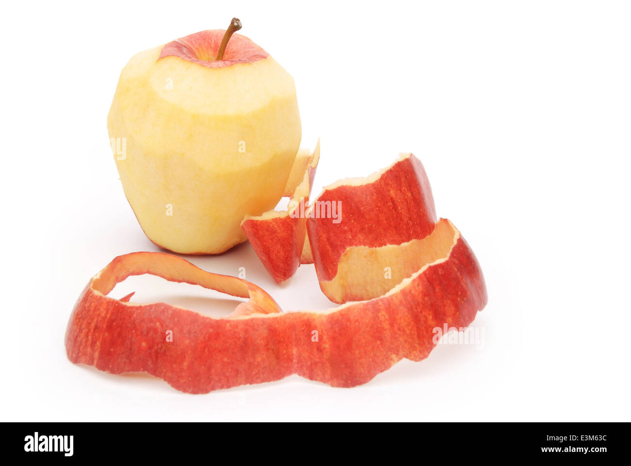 apple with peeled skin on white background Stock Photo - Alamy