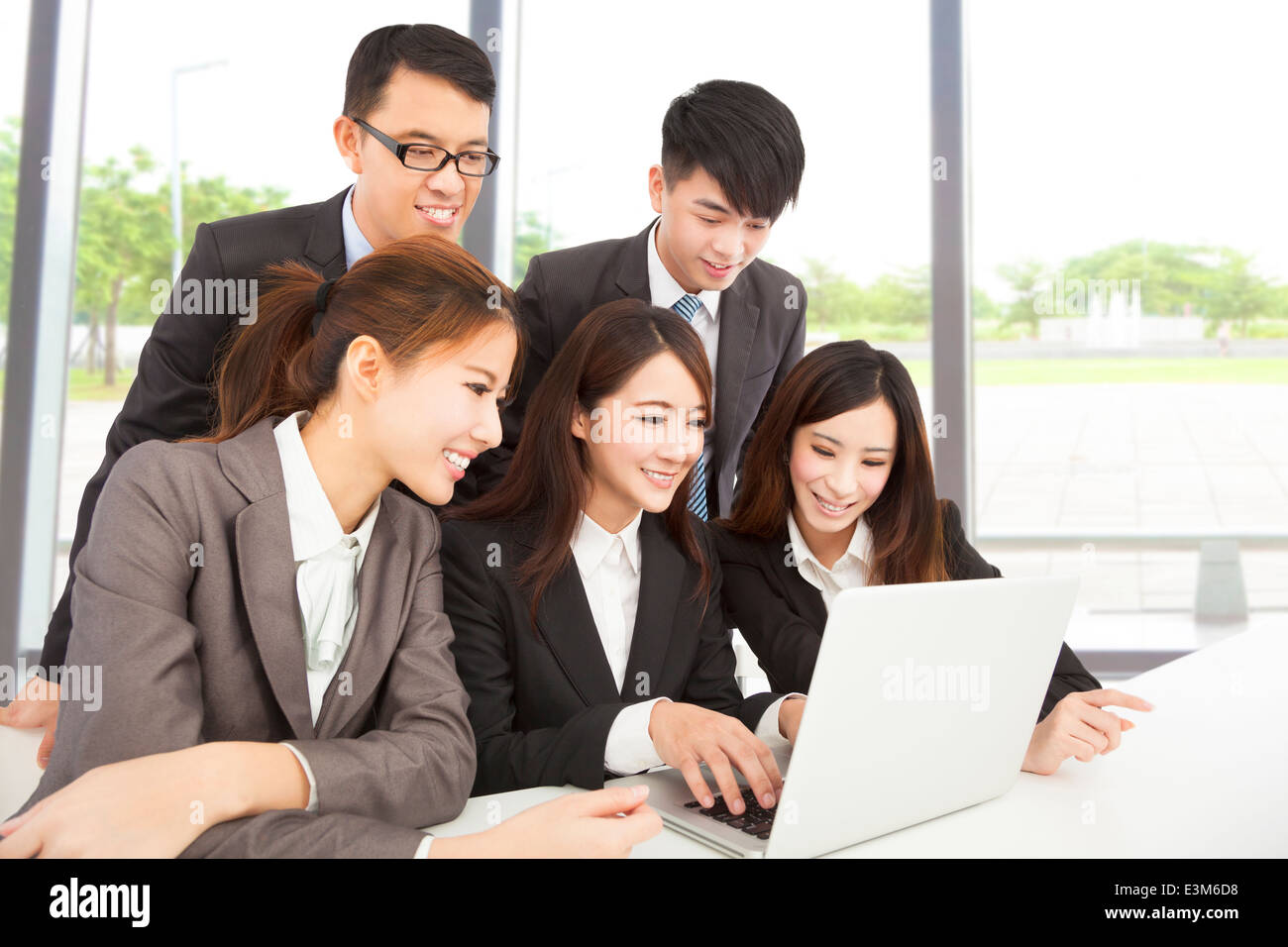 happy asian business team working in office Stock Photo - Alamy