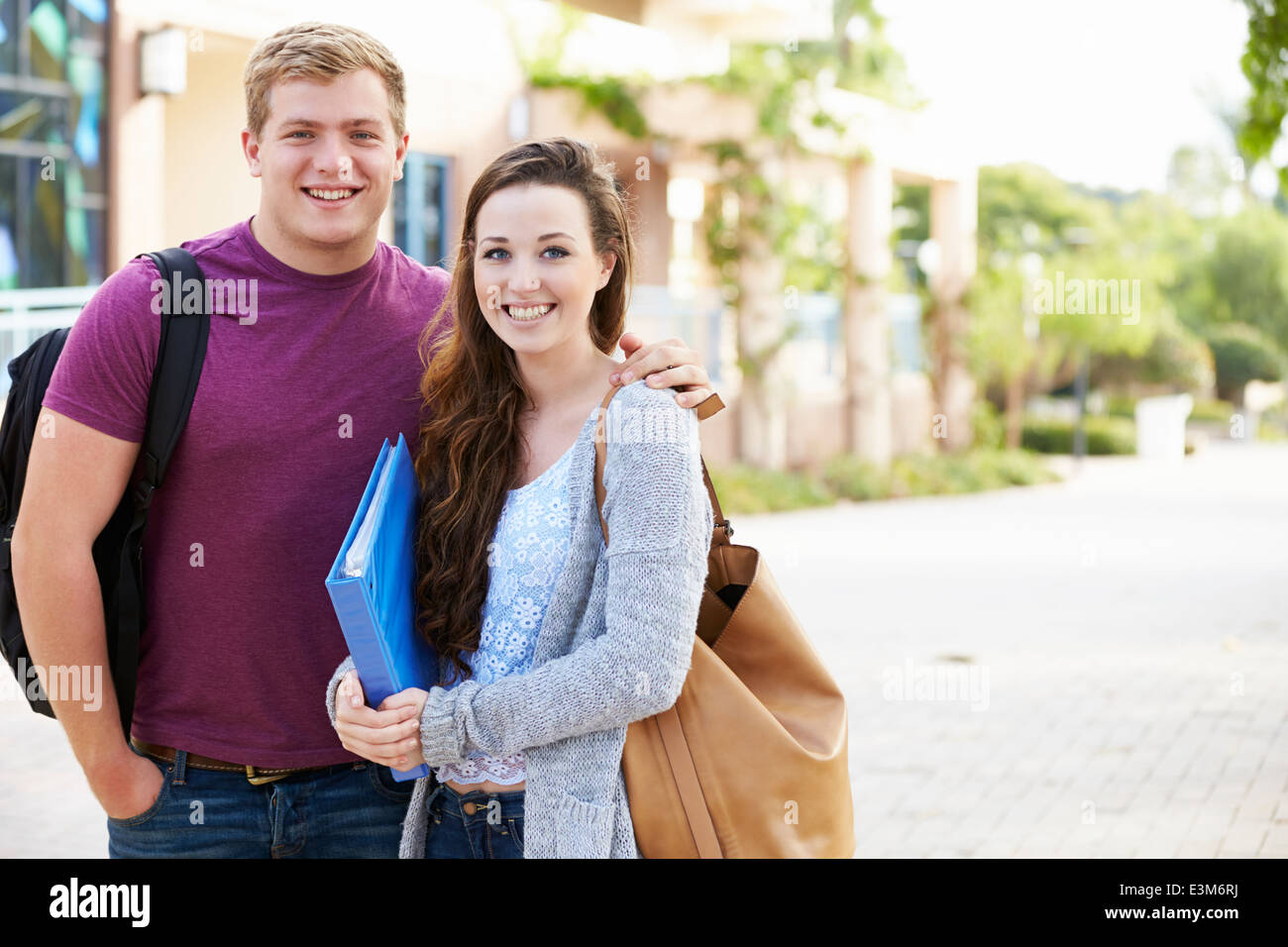 Portrait Of Student Couple Outdoors On University Campus Stock Photo - Alamy