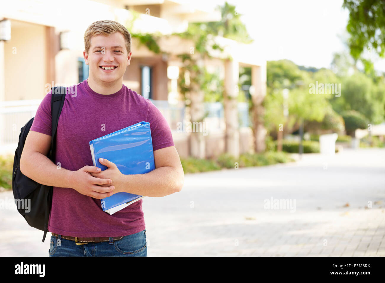 Portrait Of Male University Student Outdoors On Campus Stock Photo - Alamy