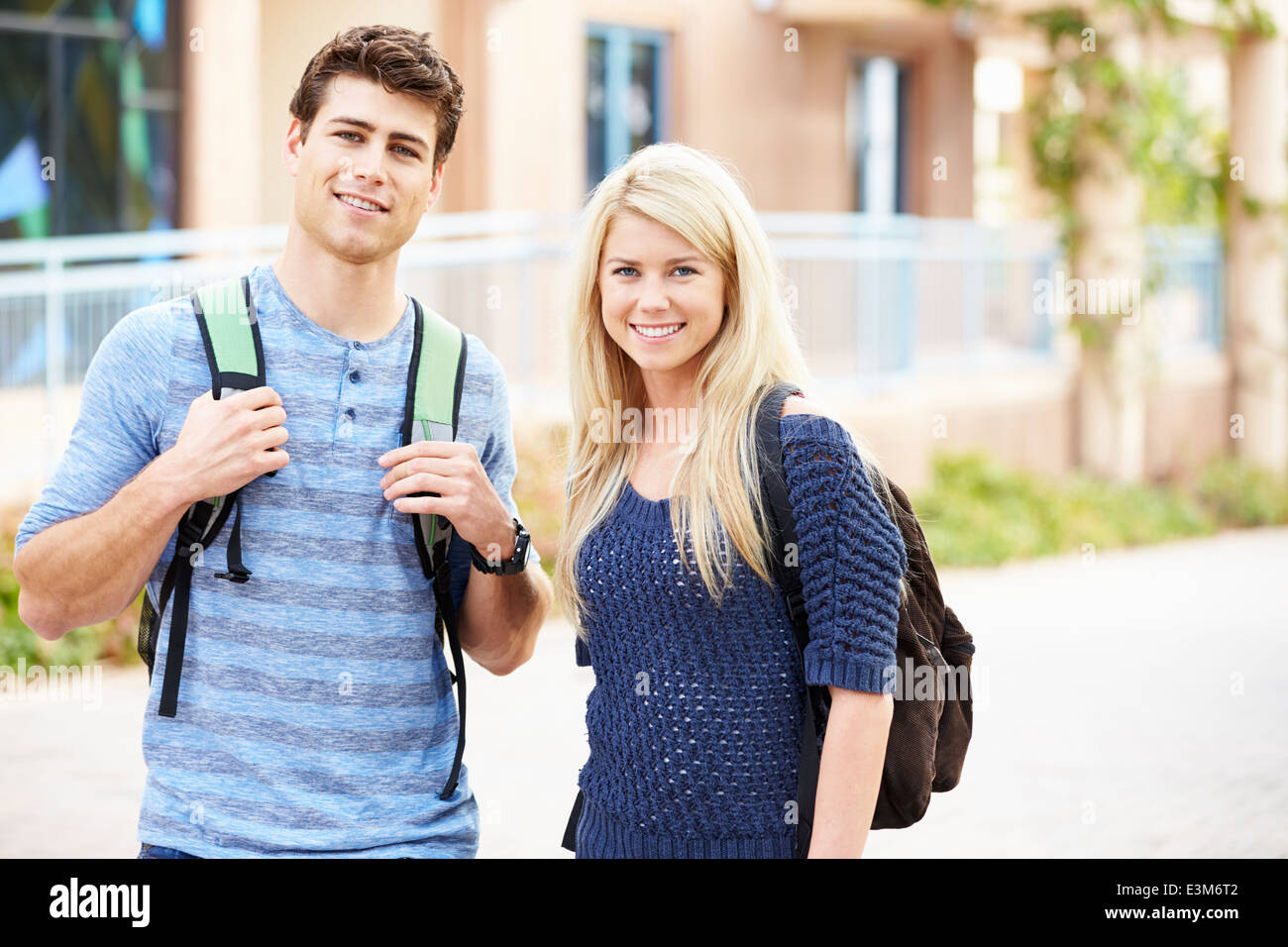 Male And Female University Students Outdoors On Campus Stock Photo - Alamy