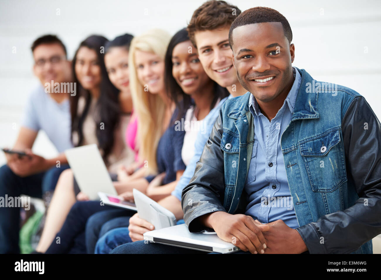 Portrait Of University Students Outdoors On Campus Stock Photo - Alamy