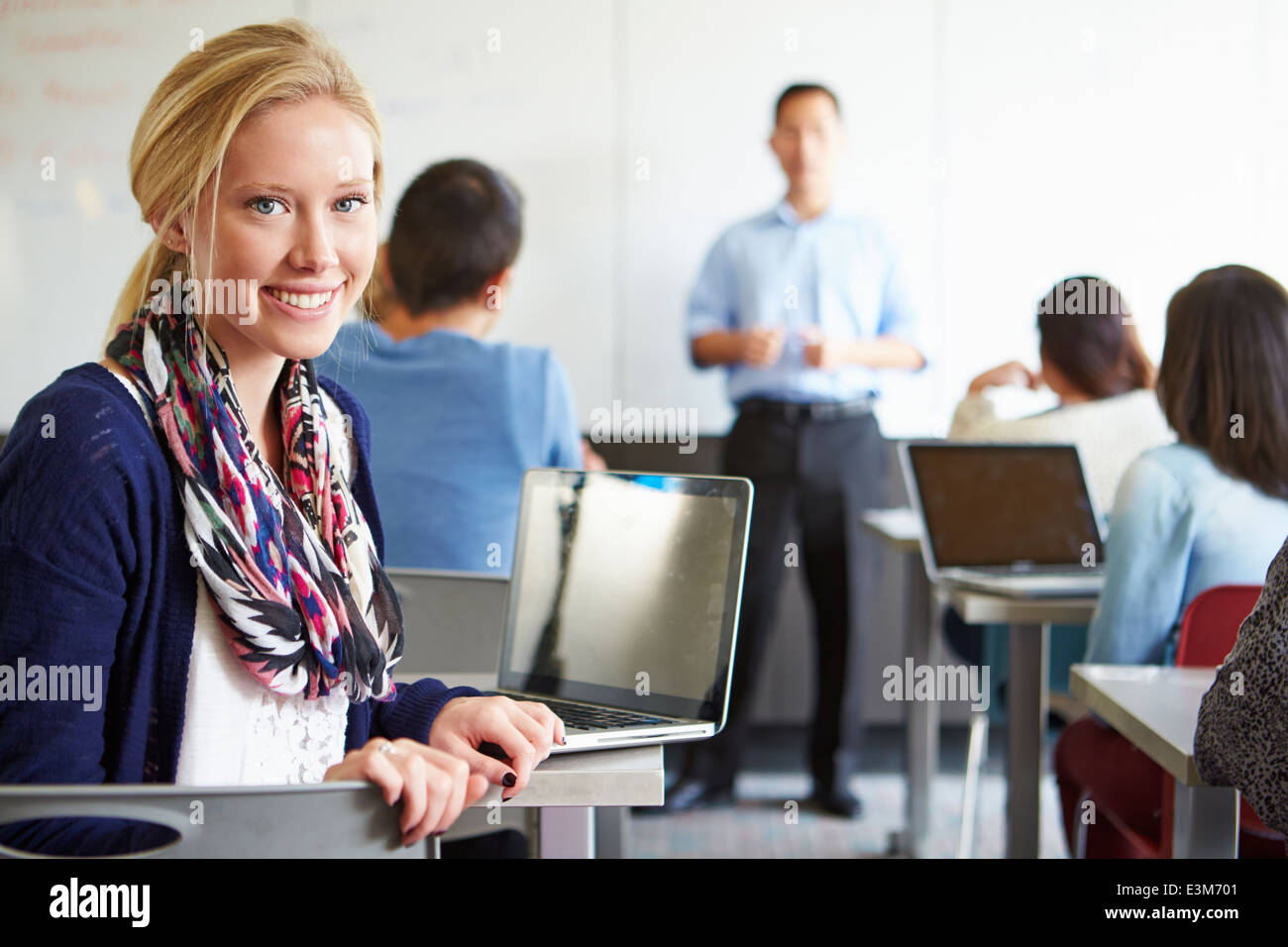 Female High School Student Using Laptop In Classroom Stock Photo - Alamy