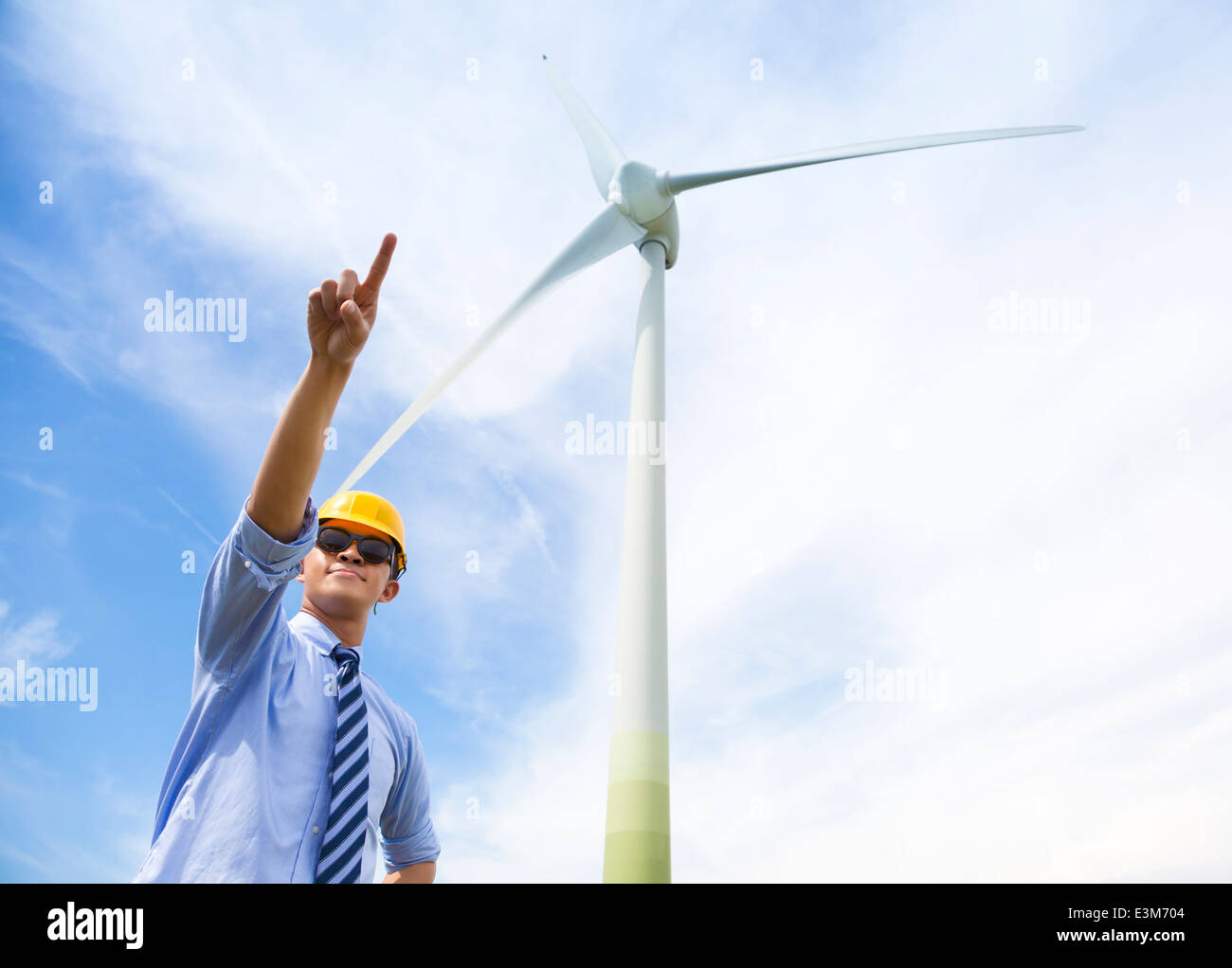 professional engineer raise his finger with wind generator Stock Photo ...