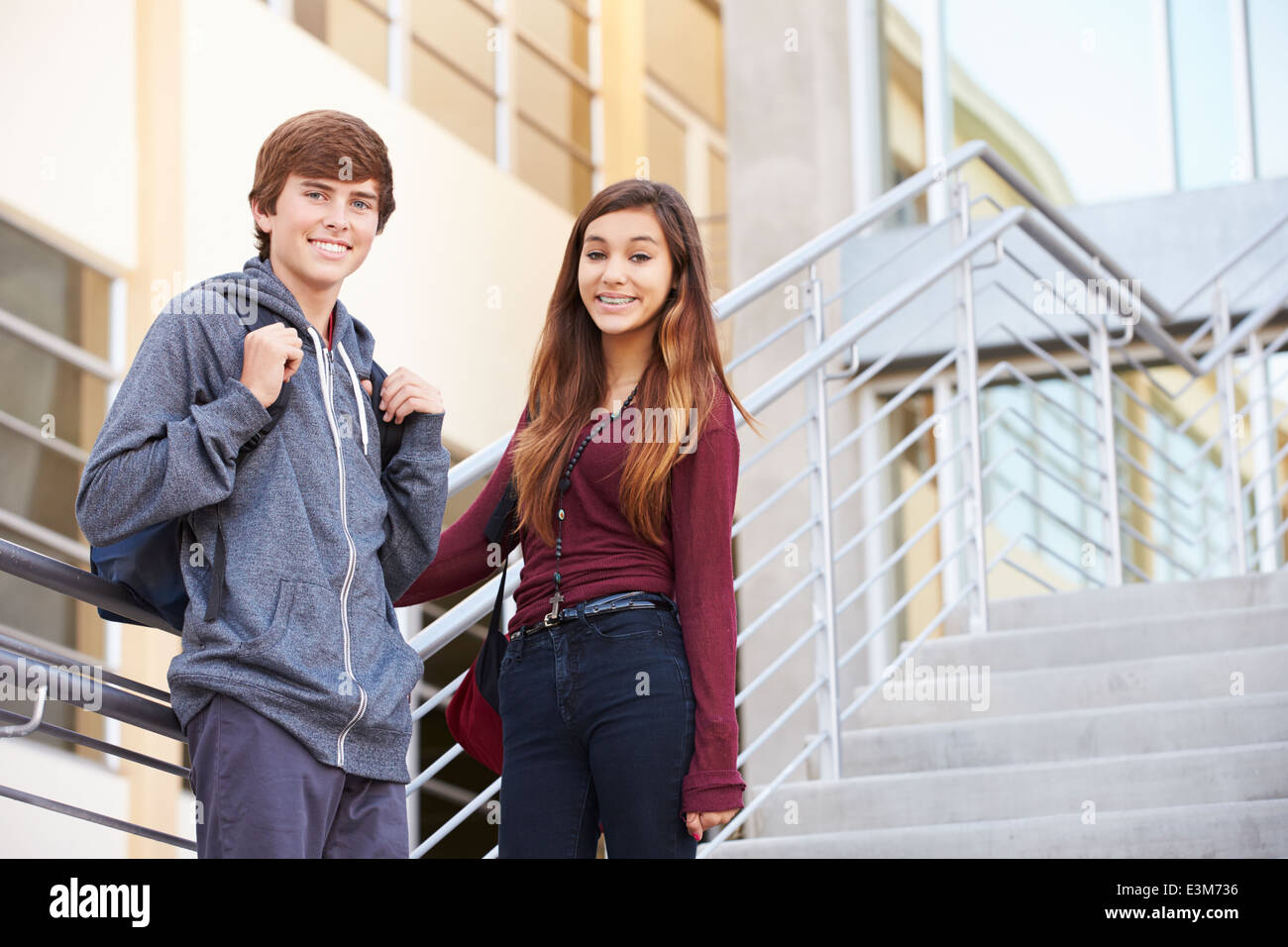 Two High School Students Standing Outside Building Stock Photo - Alamy
