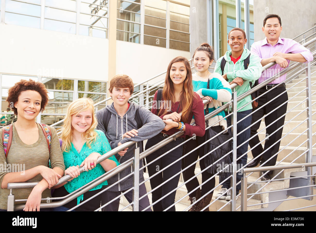 High School Students And Teacher Standing Outside Building Stock Photo ...