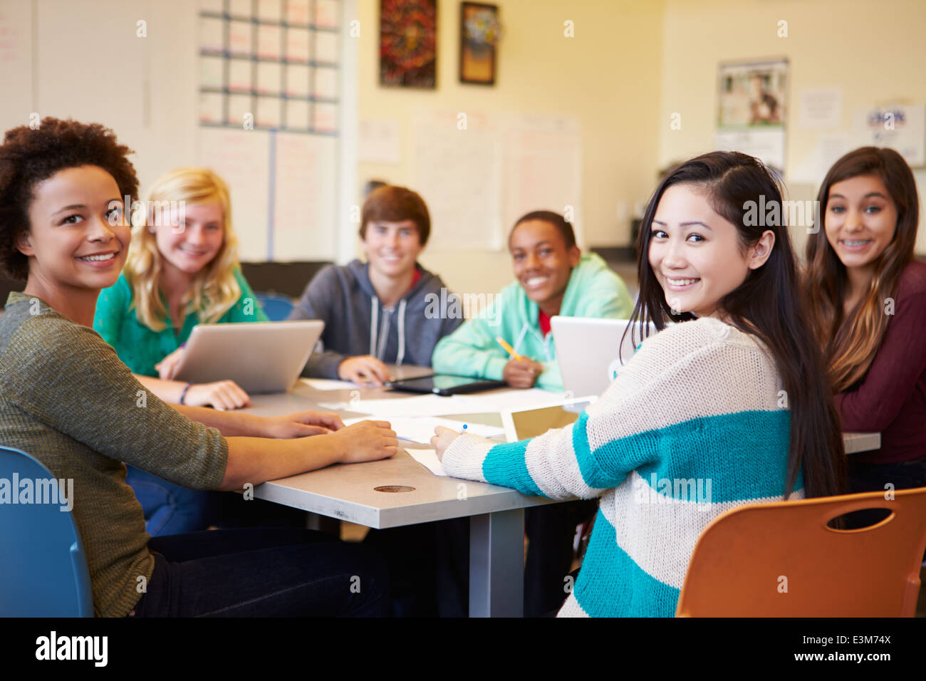 Group Of High School Students In Class Using Laptops Stock Photo - Alamy