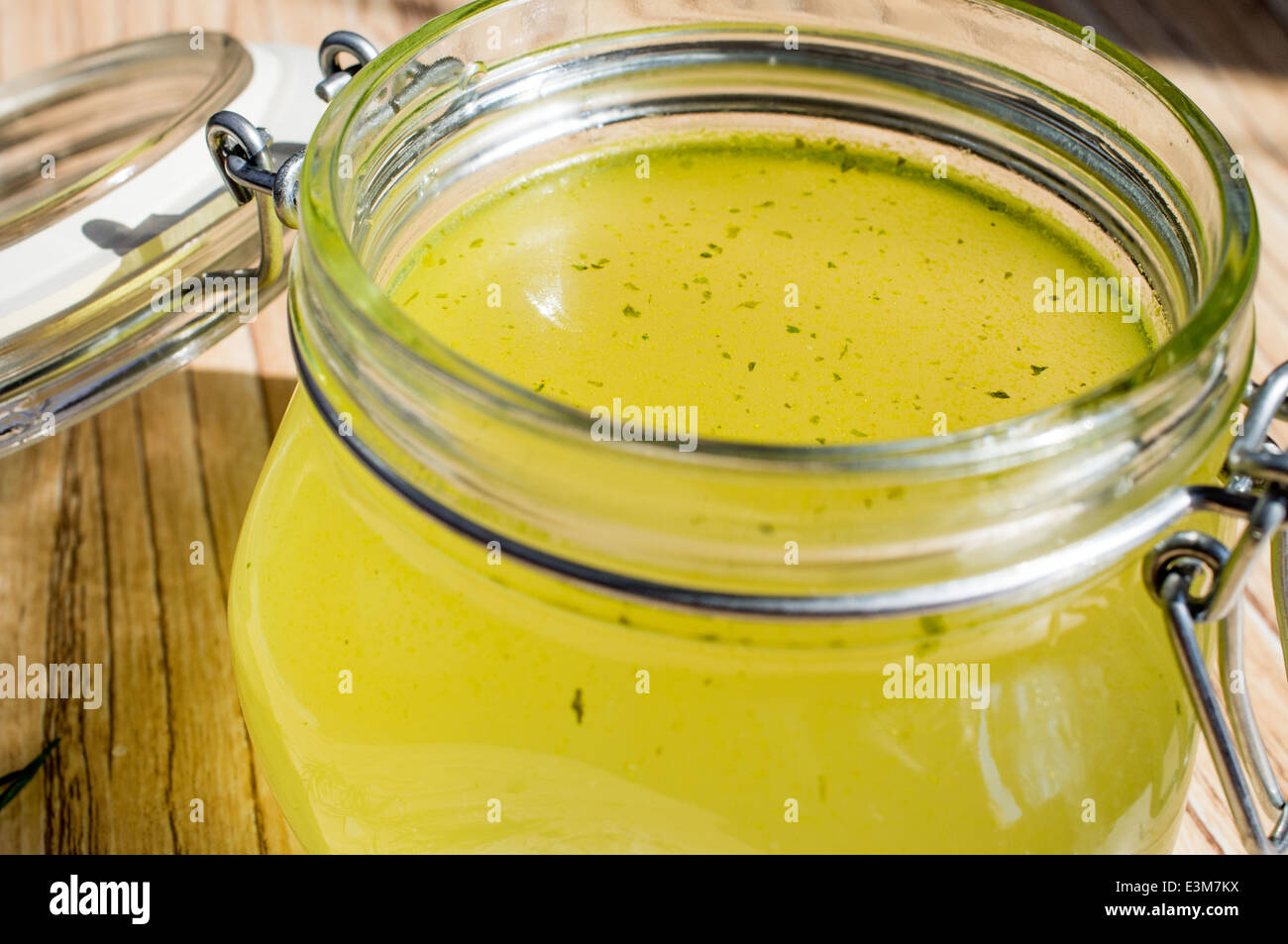Canned broth, bouillon, clear soup in a glass jar Stock Photo - Alamy