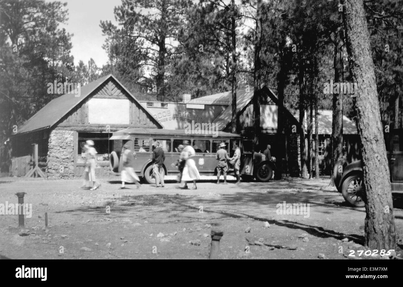 A historic photo captures a tour bus at Jacob Lake Inn, a landmark site ...