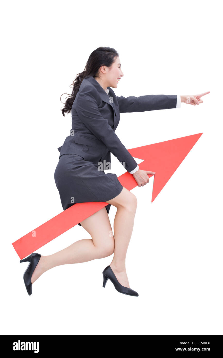 Businesswoman with red arrow sign Stock Photo - Alamy